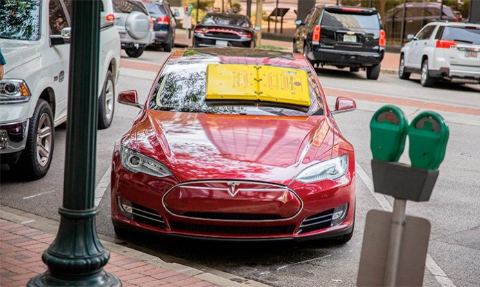 The Barnacle: Parking enforcement device that immobilizes a vehicle in ...