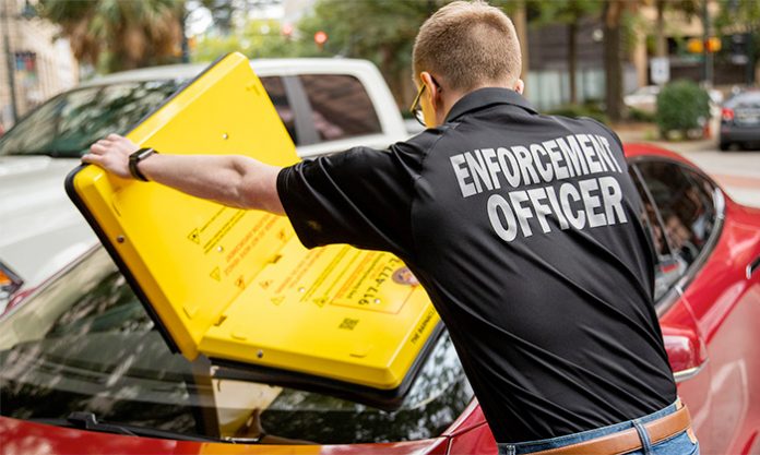 The Barnacle: Parking enforcement device that immobilizes a vehicle in ...