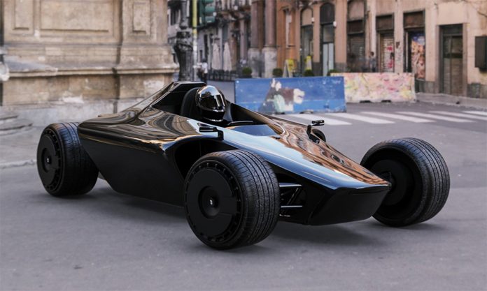 Sleek racecar with an aerodynamic design and a Tesla engine