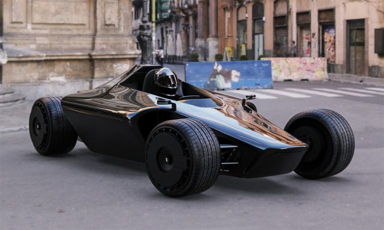 Sleek racecar with an aerodynamic design and a Tesla engine