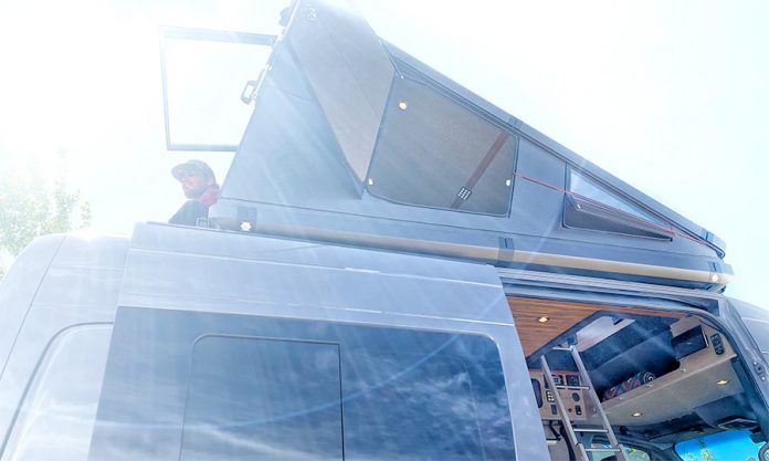 Solar powered hard-sided carbon fiber roof top camper