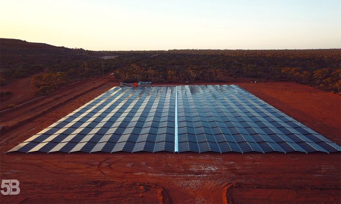 Hinged, folding solar array for rapid deployment at industrial scale