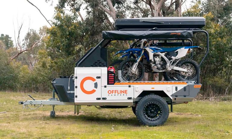 Ryder camper trailer carves out the interior to haul three dirt bikes