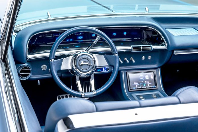 Custom 1964 Chevrolet Impala Convertible Lowrider tilts on three wheels