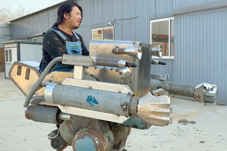Inventor builds security patrol mech robot, complete with fists and ...