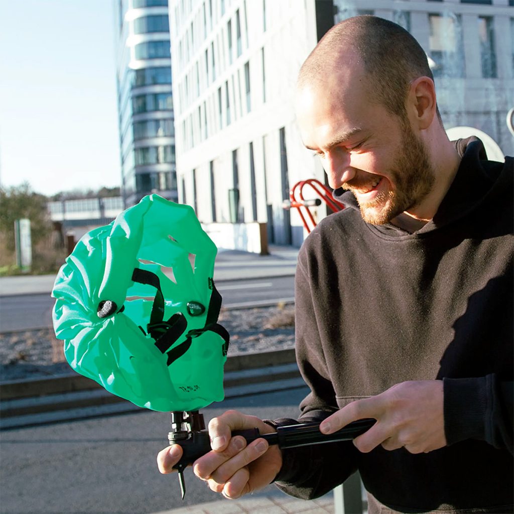 Inflatable bike helmet packs small enough to fit in your pocket