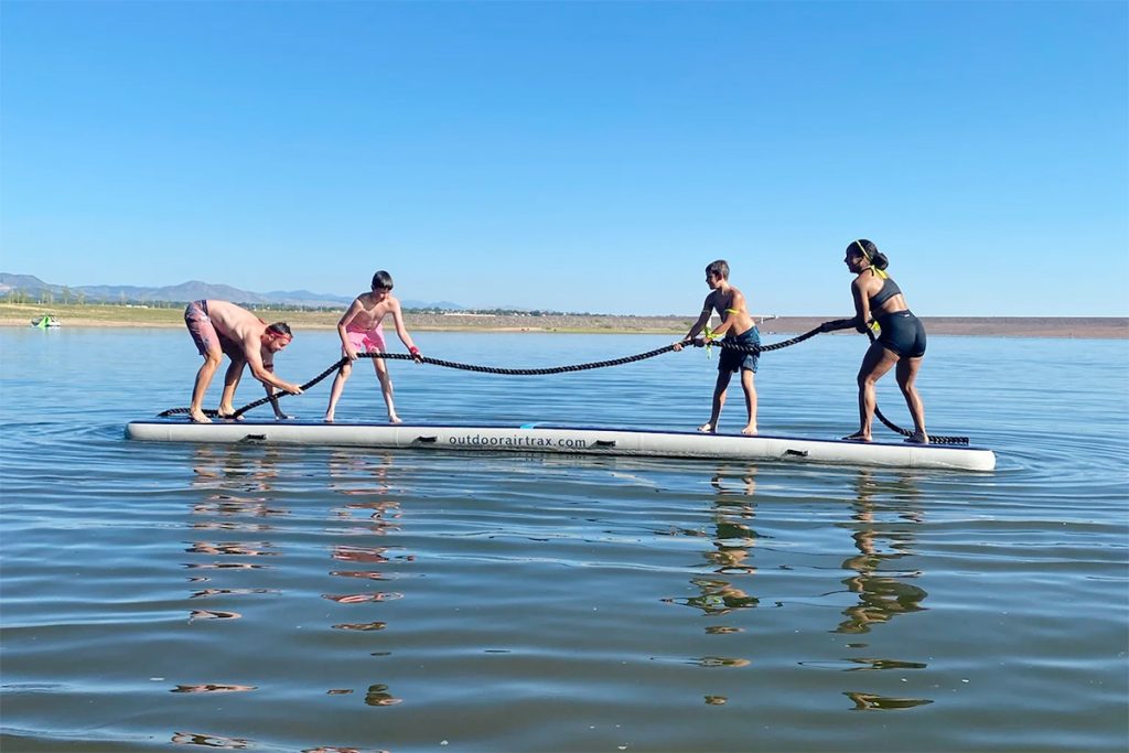 All-terrain inflatable fun board designed to bounce, propel, float and sled
