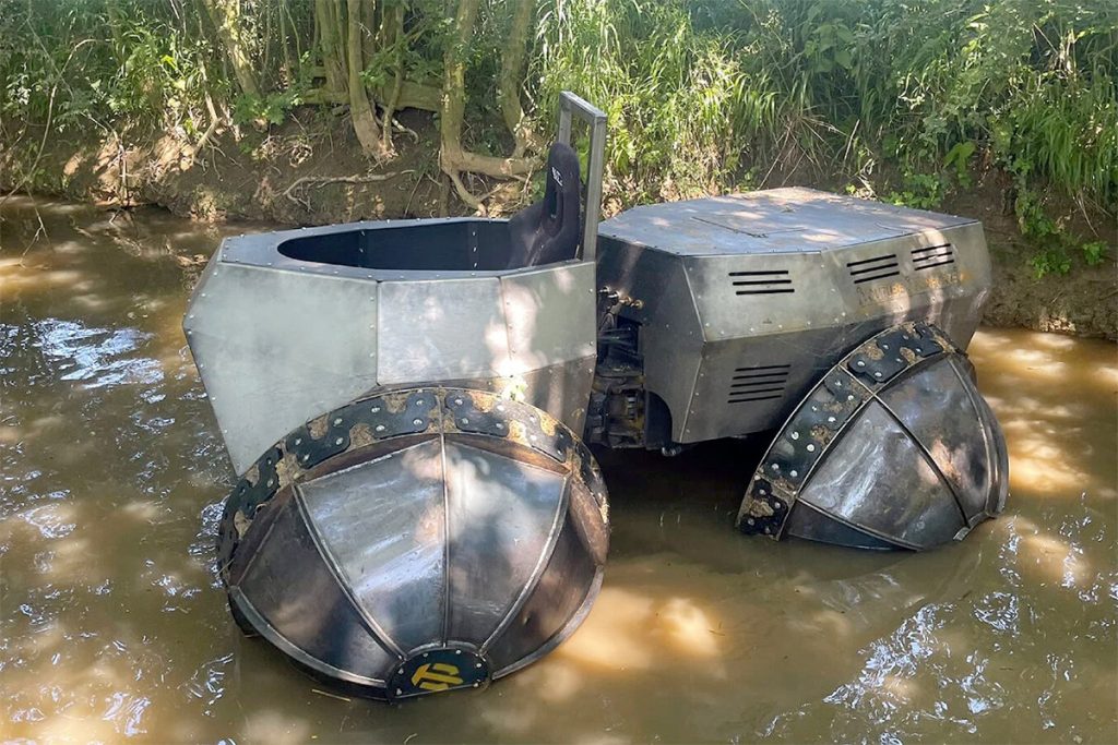 Inventor re-purposes old tractor into an all-terrain, armored 'rhino tank'