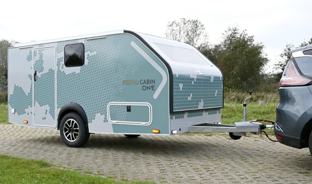 Aero Cabin camping trailer features a pop-up roof and slide-out front