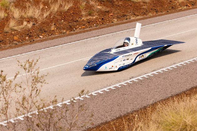 Ingenious fin-topped solar car triumphs in harsh Australian race