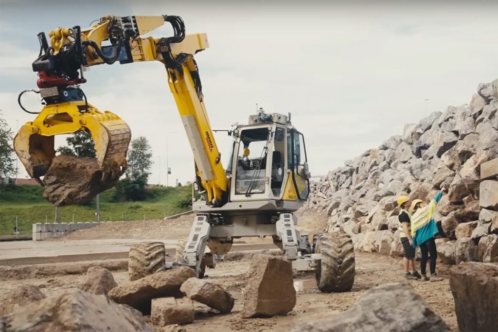Autonomous excavator constructs giant stone wall with no human assistance