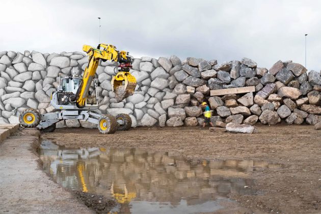 Autonomous excavator constructs giant stone wall with no human assistance