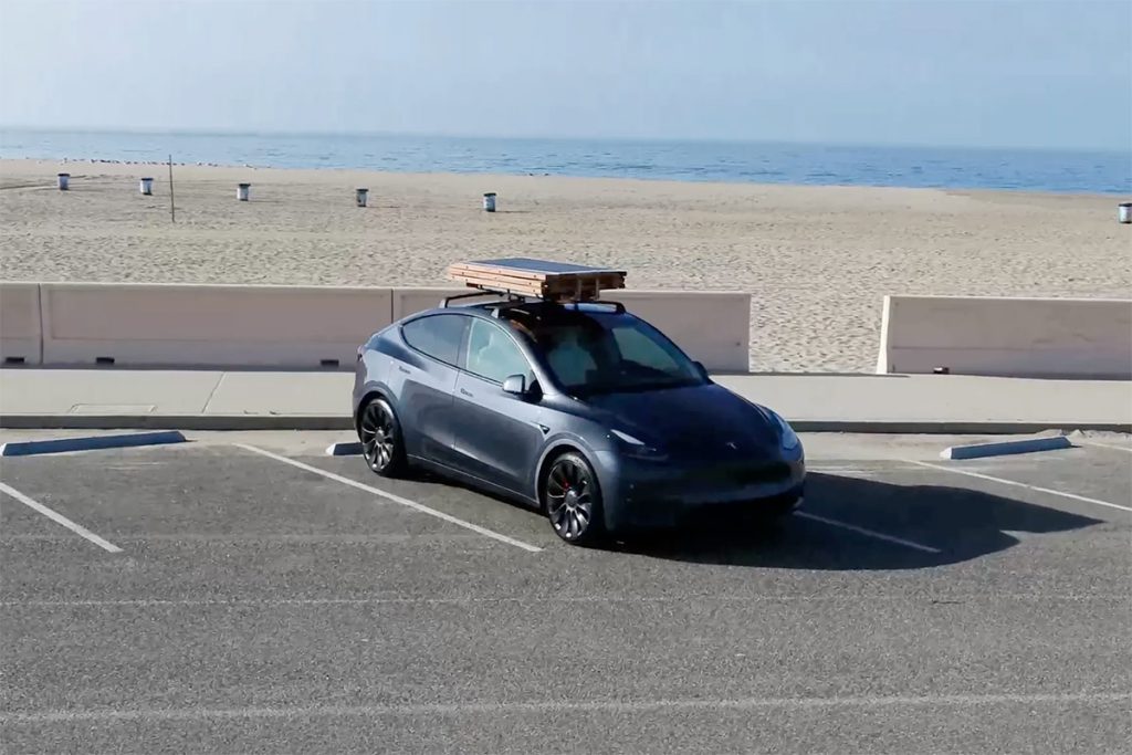 Folding rooftop solar array to self charge your EV