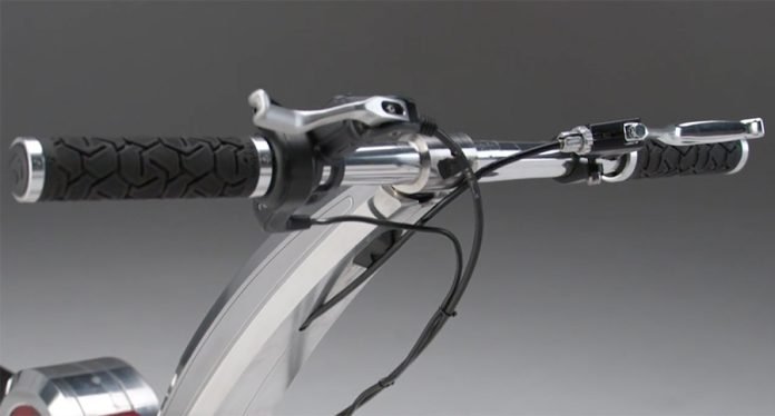 Three-wheeled mobility device with pump-action system lets you ride in ...