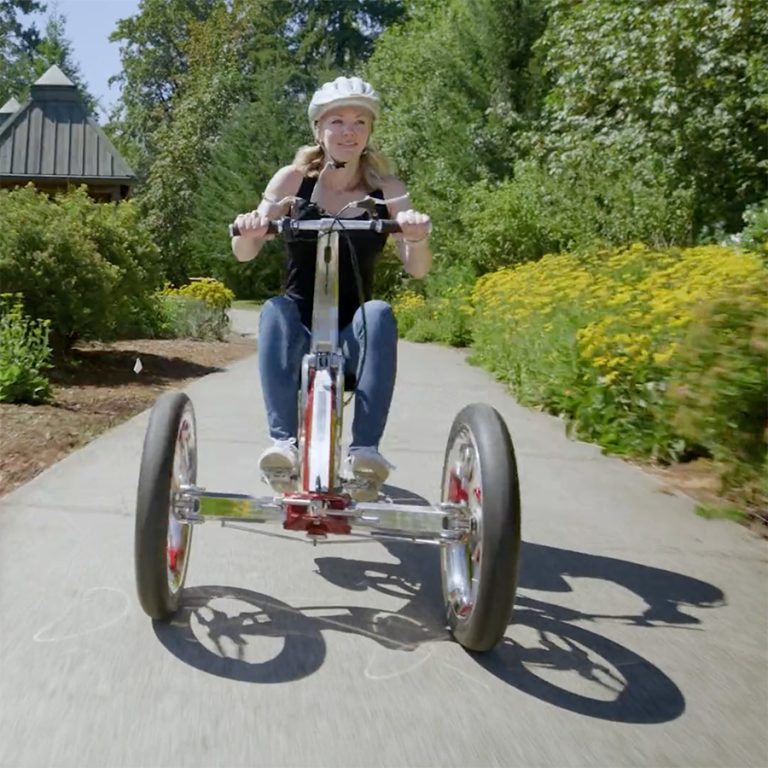 Three-wheeled mobility device with pump-action system lets you ride in ...