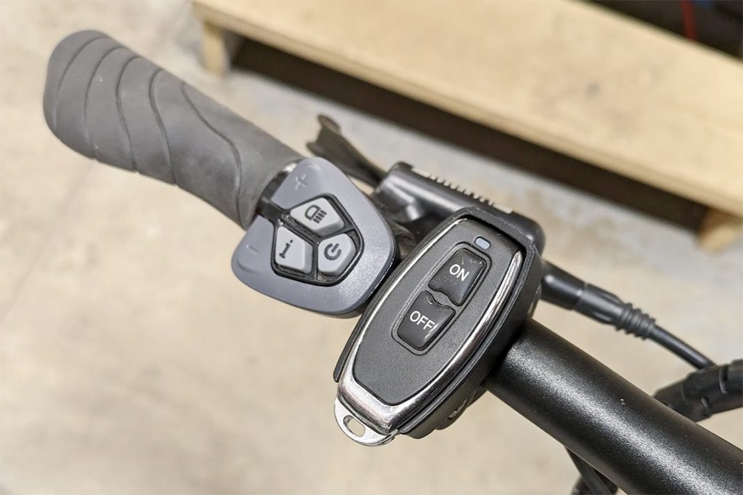 Motorized trailer sweeps away glass and debris from bike lanes