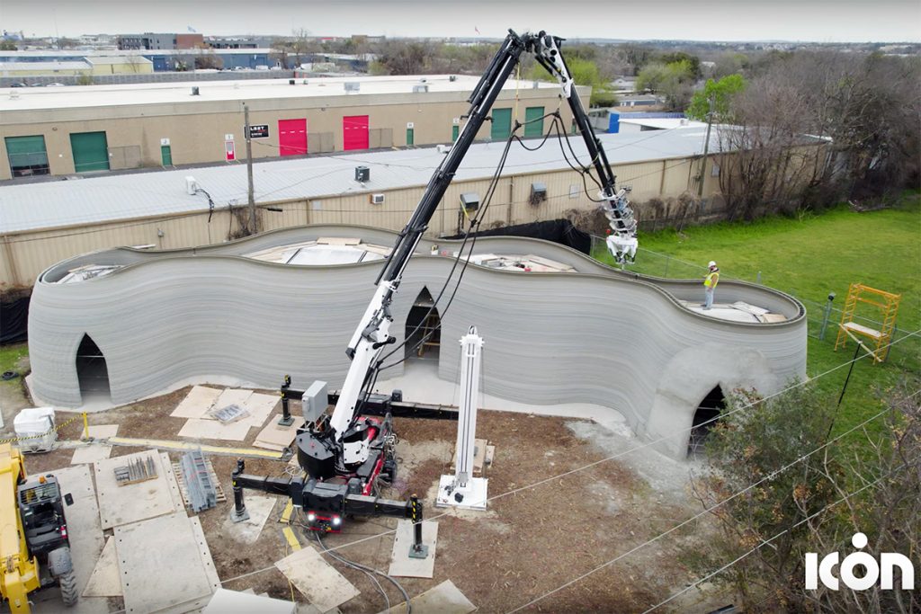 Giant robotic arm innovates construction with 3D-printed two-story houses