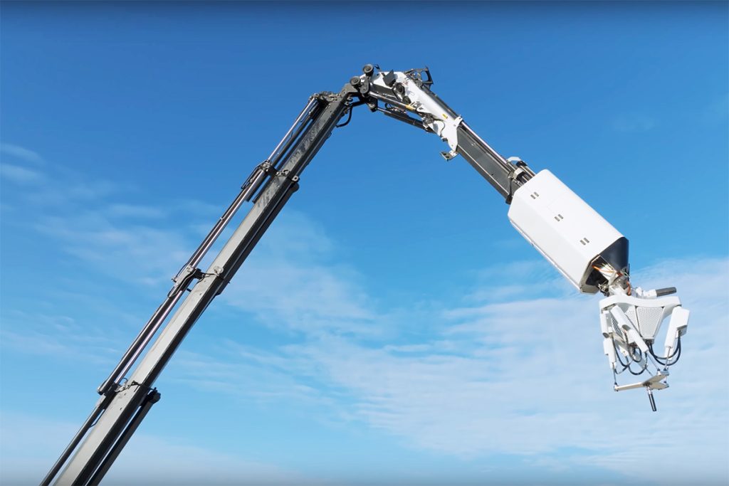 Giant robotic arm innovates construction with 3D-printed two-story houses