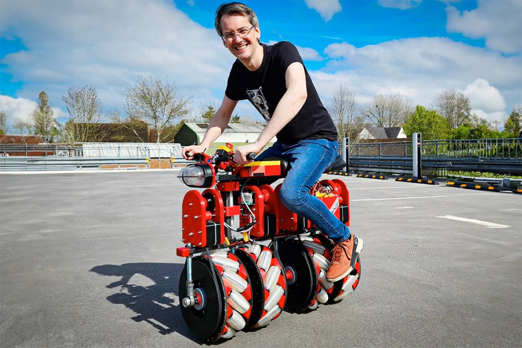 Self-balancing motorcycle rolls on four custom-made omnidirectional wheels
