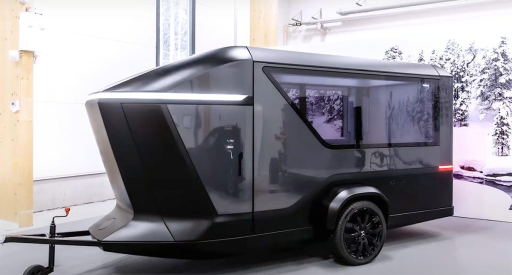 Sleek camper trailer features a secret bathroom and flexible interior