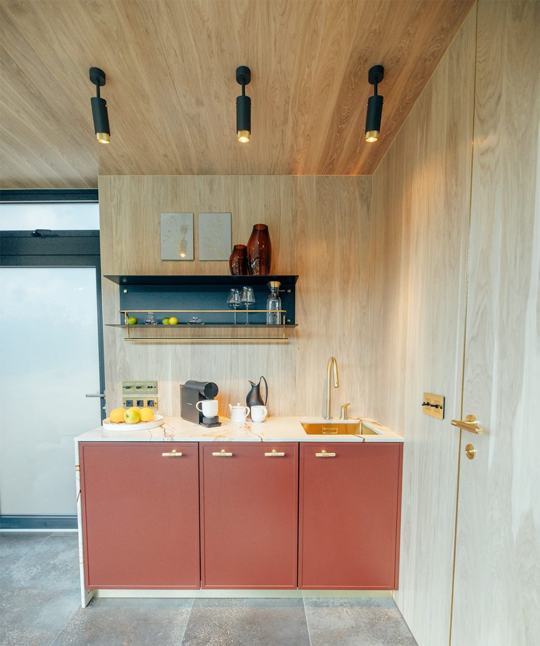 $250K golden tiny house offers a luxury twist on the small living movement