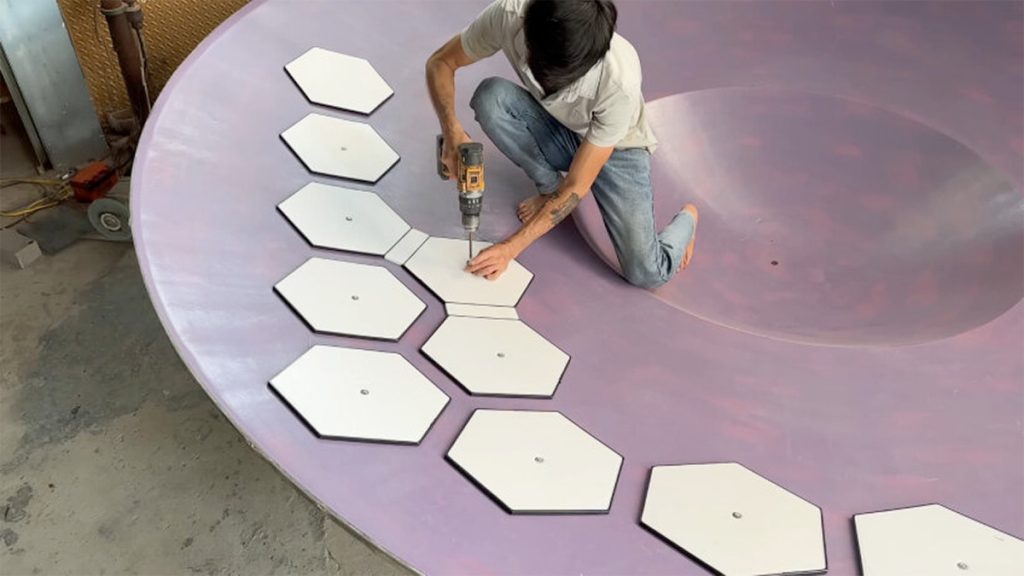 Craftsman builds functional UFO jet boat that zooms through water