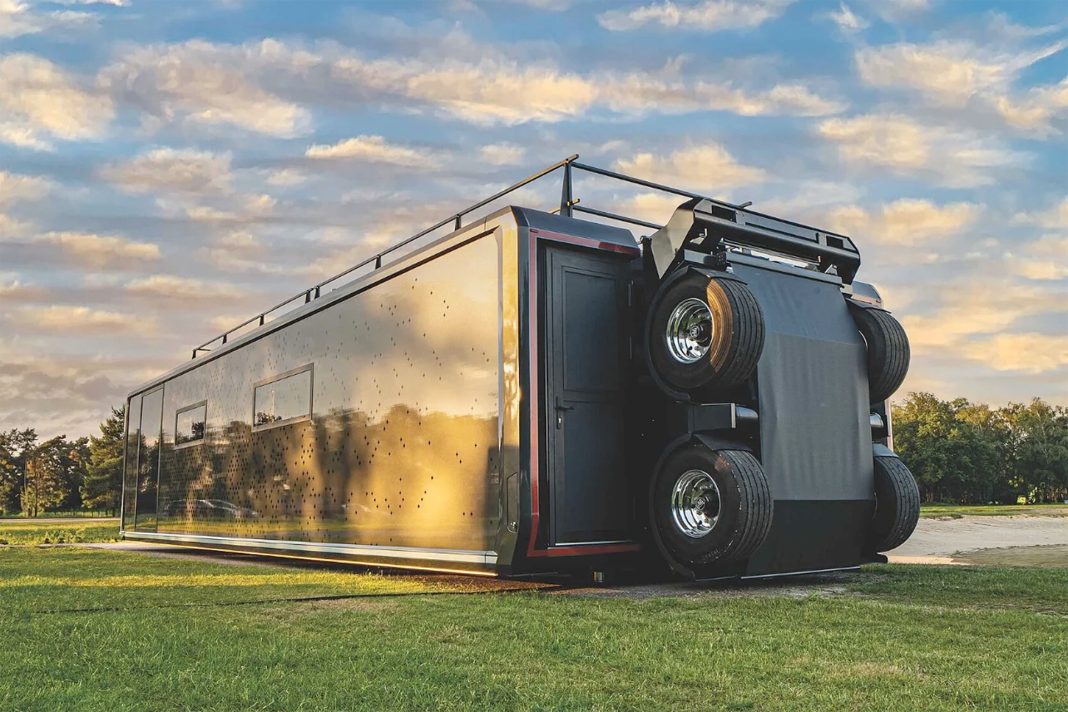 Mobile unit transports like a trailer, docks flat for ground-level ...