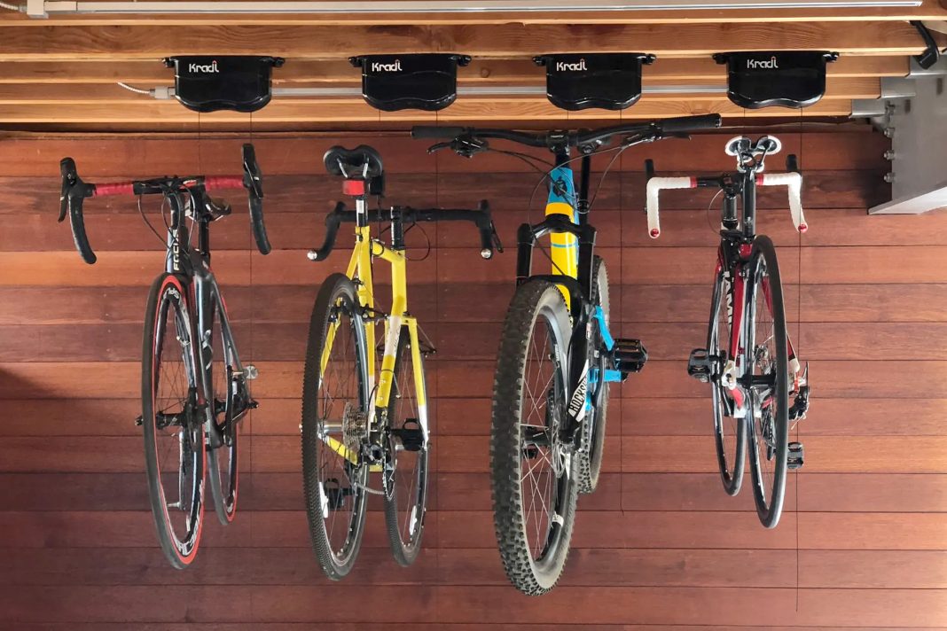 Unpowered ceiling mount makes bicycle storage simple and efficient