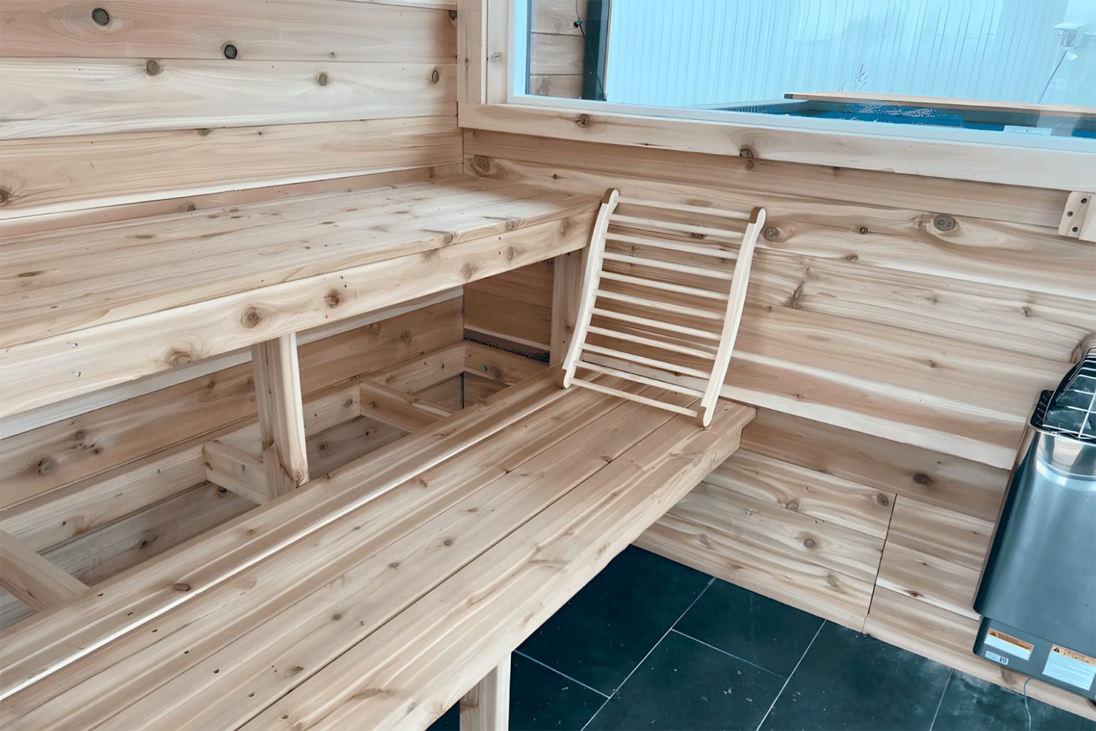 Shipping container-based sauna and plunge pool designed for backyards