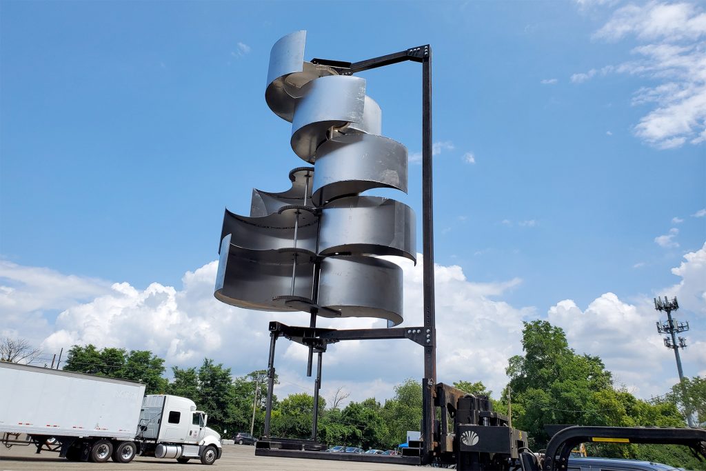 Vertical axis wind turbine with unique furling mechanism for high-wind ...