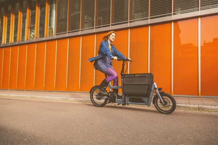 Front-loading cargo ebike folds to half its size between hauls