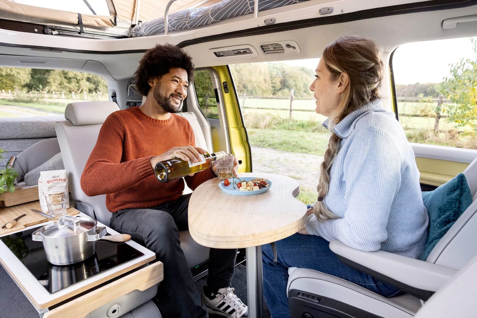 Volkswagen ID. Buzz camper van reimagined with a side-popping sleeper roof