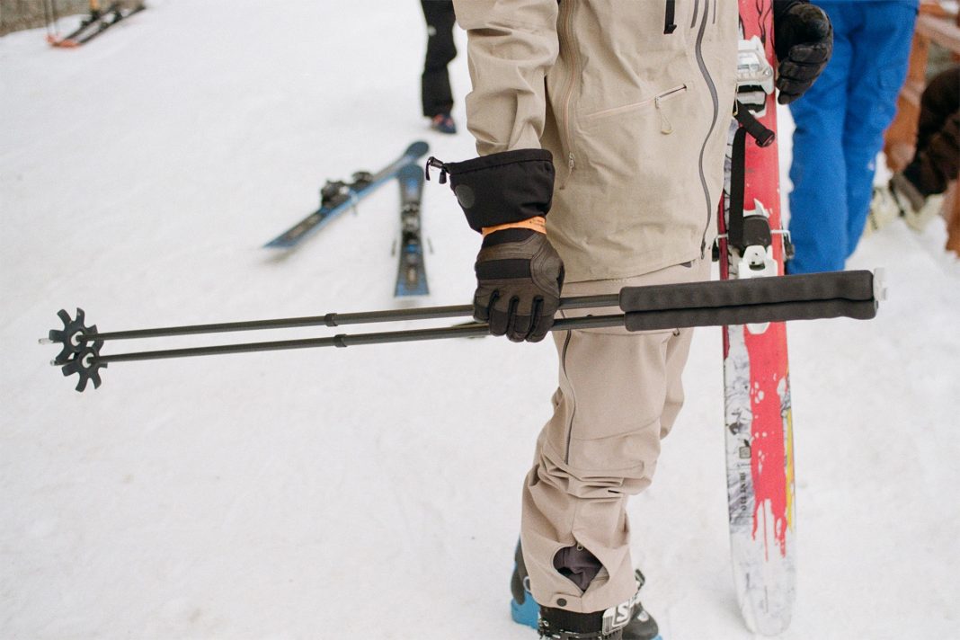 Magnetic ski poles stick together to make carrying easier