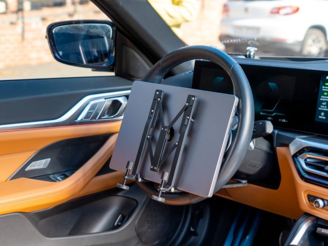Caro Stand & Table turns your car into a portable workspace