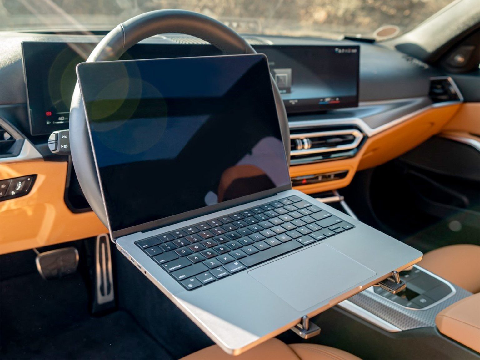 Caro Stand & Table turns your car into a portable workspace