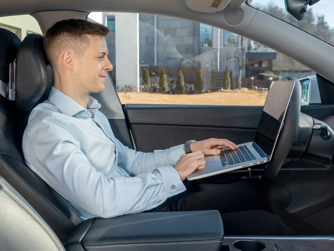 Caro Stand & Table turns your car into a portable workspace