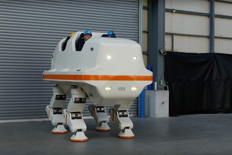 Rideable walking robot that looks like a sci-fi rhino